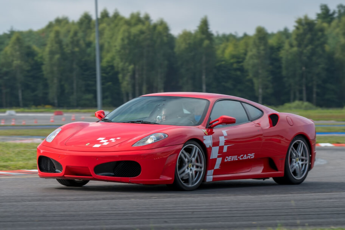 Driving behind the wheel of a Ferrari F430 around the track (2 laps) 2 ...