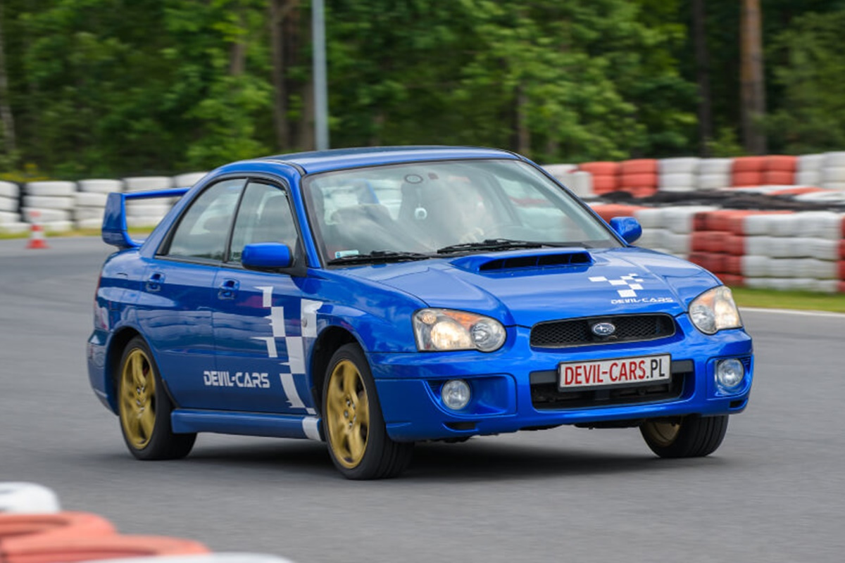 Driving behind the wheel of a Subaru Impreza on the track (2 laps) 2 ...